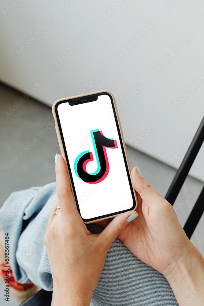 Mobile phone with the TikTok Logo on the screen Stock Photo | Adobe Stock