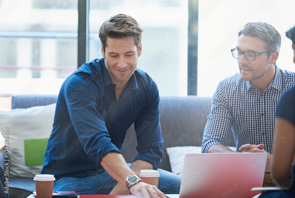 Bringing there designs into digital life. a group of office workers ...