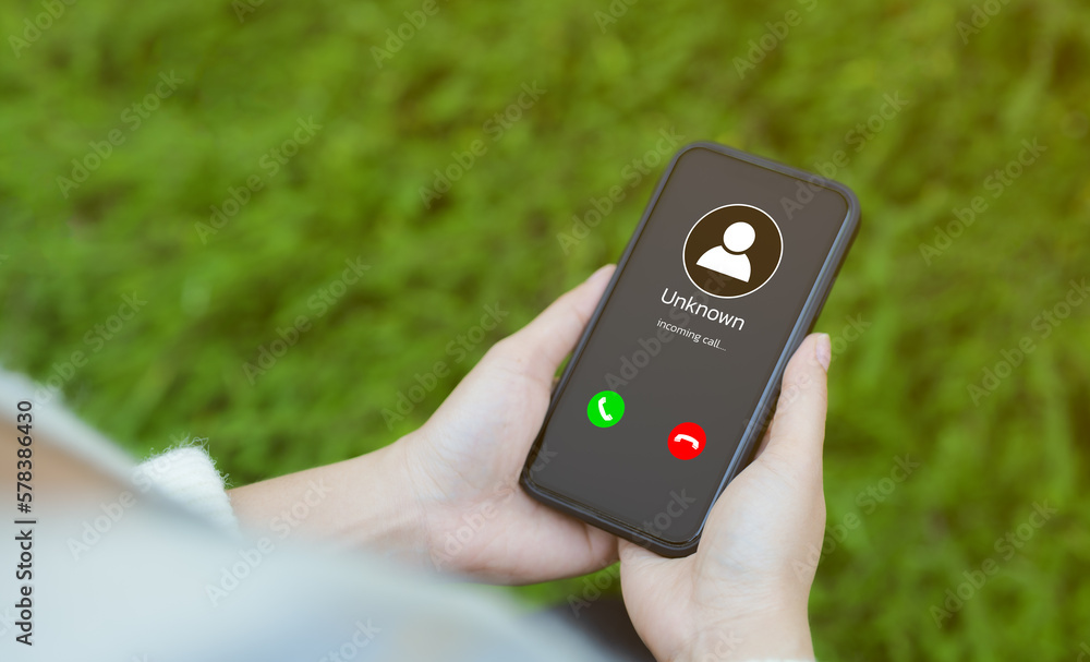 Fraud or phishing with smartphone concept. Woman holding mobile phone ...