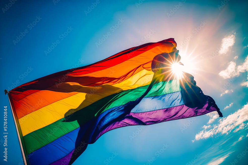 Pride Courage And Equality The Rainbow Flag Flies Proudly In A Blue