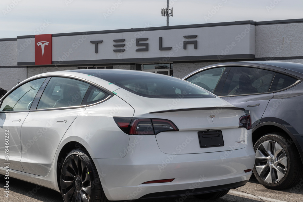 Tesla EV electric vehicles on display. Tesla products include electric ...