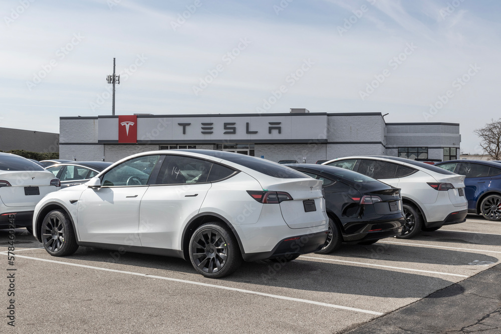 Tesla EV electric vehicles on display. Tesla products include electric ...