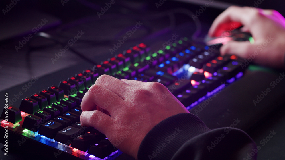 Male hands is typing on the computer keyboard, close up view. Man ...
