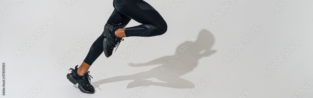 Professional male athlete running isolated on white studio background ...