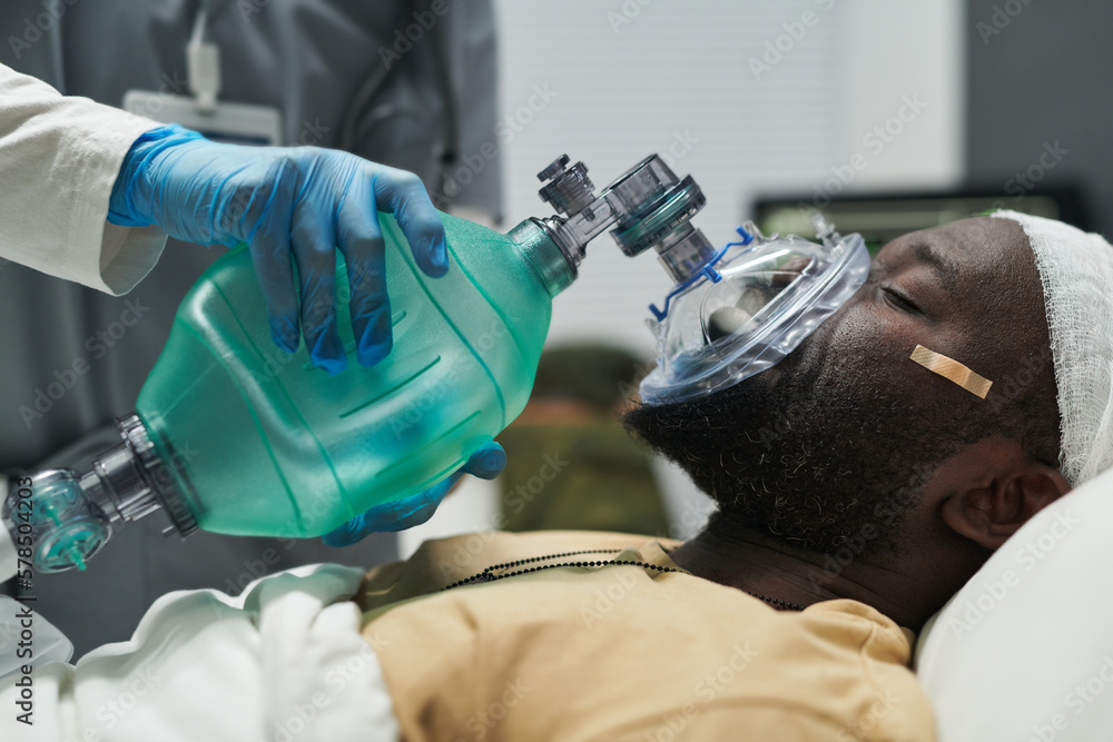 Fotografia do Stock: Close-up of sick man or injured soldier lying in ...
