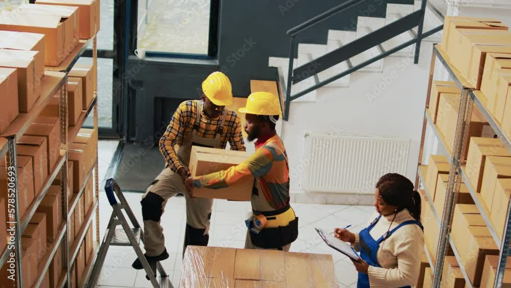 Vídeo do Stock: Group of people working on stock logistics in depot ...