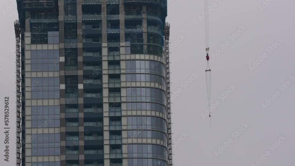 Wideo Stock: Skyscraper building under construction. 4K video with ...