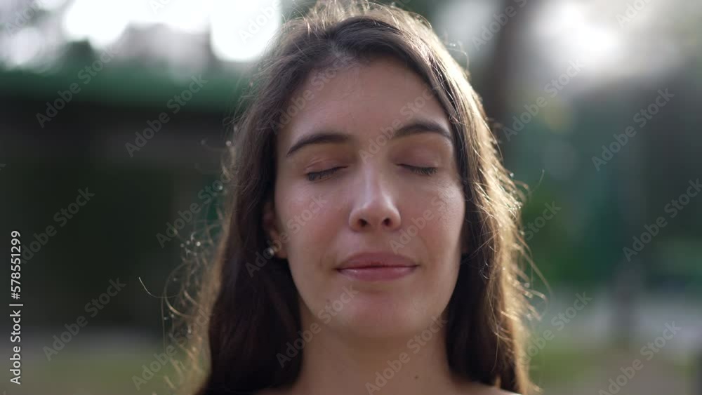 One peaceful woman closing eyes in meditation. Contemplative person in ...
