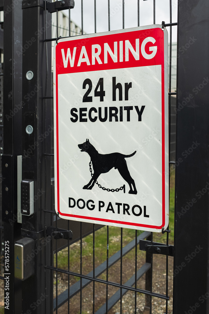 Warning Guard Dog On Duty Sign on a gate. 24 hours security dog patrol ...