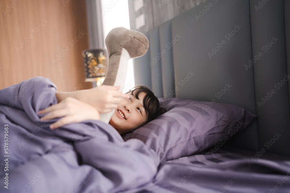 asian children girl person are sleep on bed at home, little young cute ...