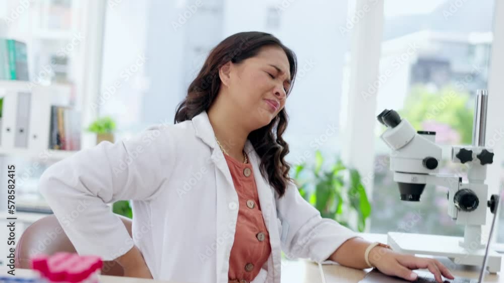 Back pain, healthcare and woman in hospital at desk with muscle tension ...