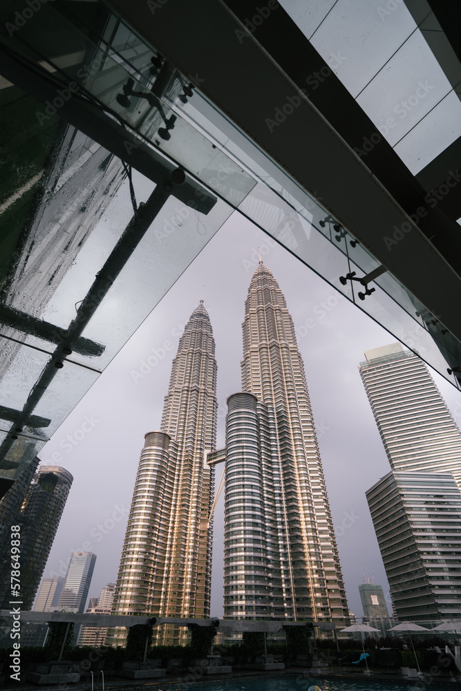 KUALA LUMPUR, MALAYSIA - JUL 28, 2019: KLCC twin tower exterior view ...