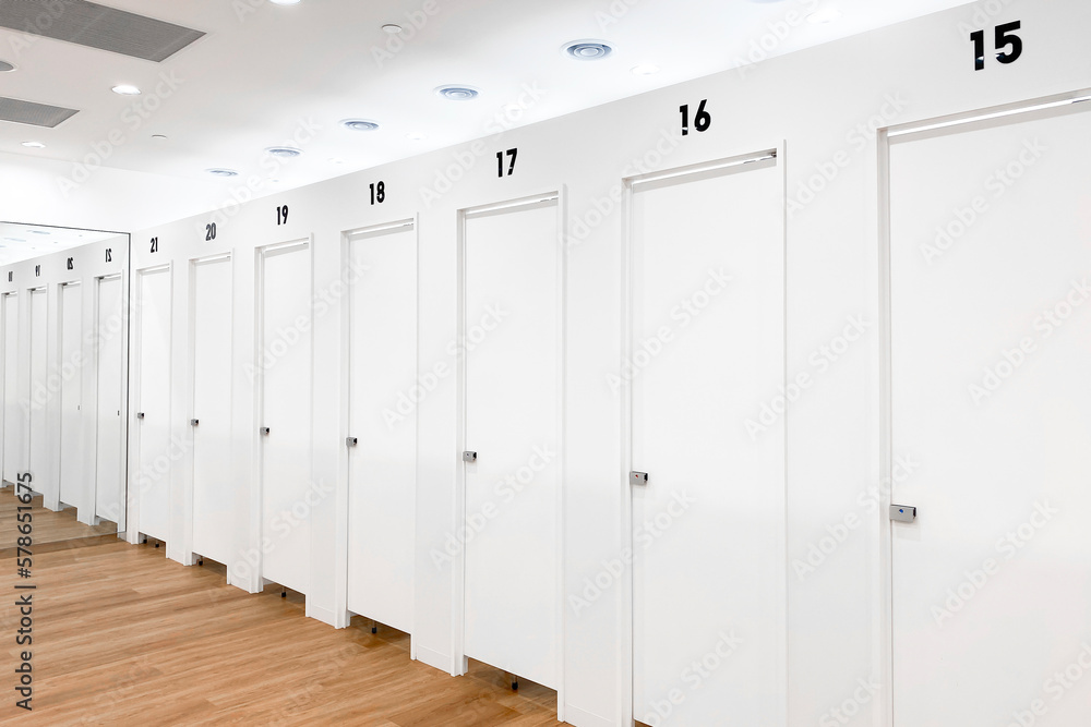 White theme minimalism changing room. White wall and wooden floor Stock ...