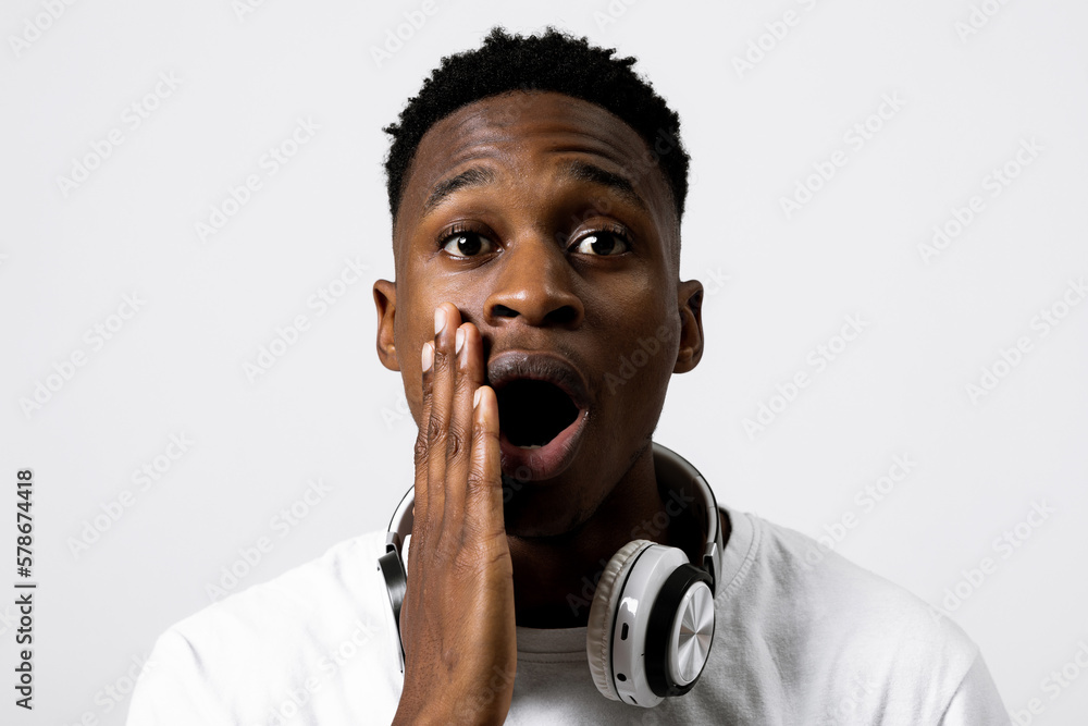 Handsome black african american guy over grey white background in ...