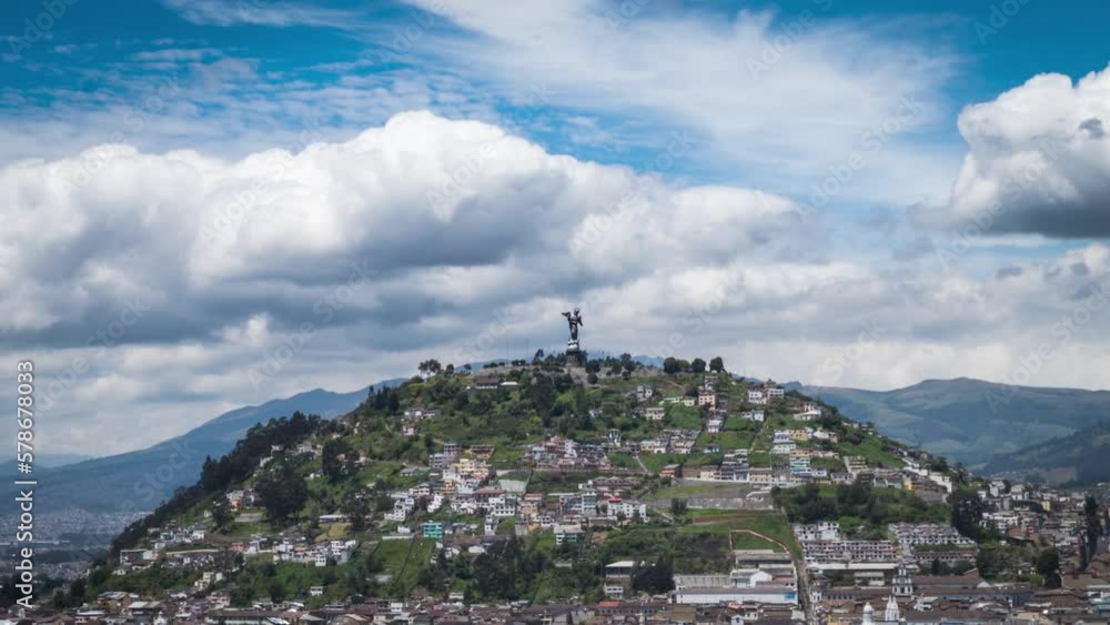 Aerial timelapse of Angel de la Virgen de Quito at the top of the hill ...