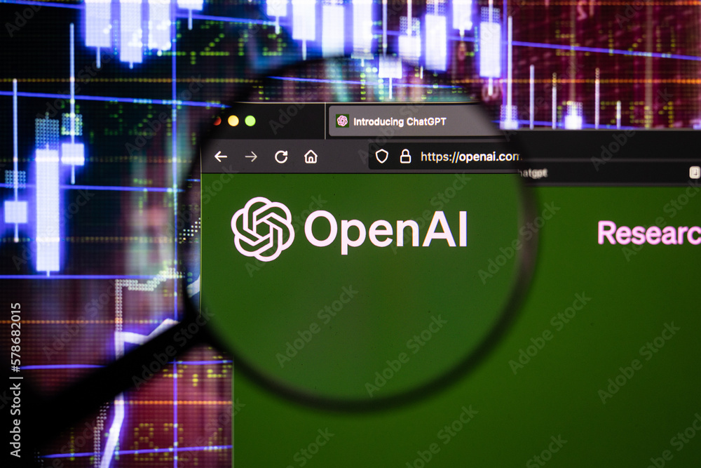 OpenAI chatbot company logo on a website with blurry stock market ...