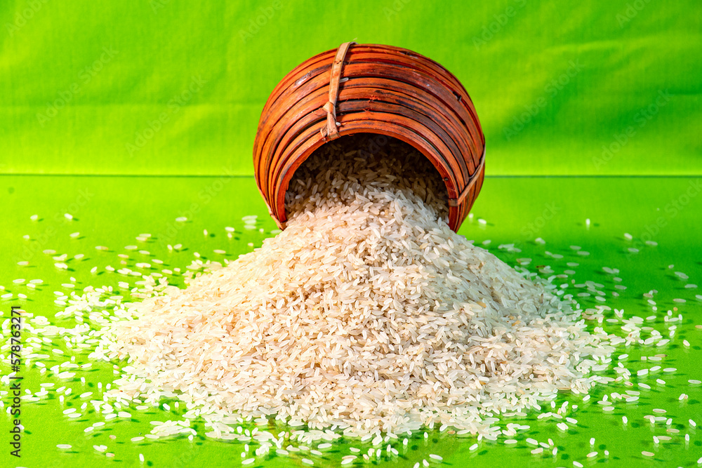 Rice measurement handmade cane pot used in Indian kitchens filled with ...