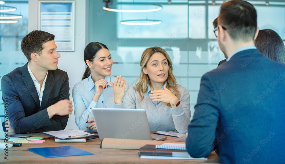Group of corporate business people having a meeting with successful ...