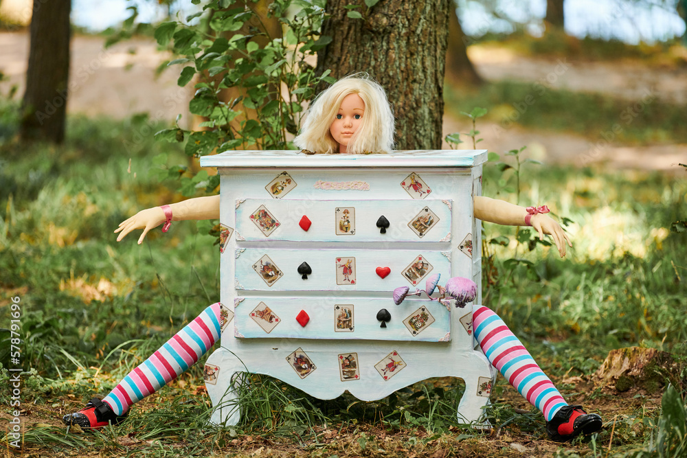 Dresser with doll Alice inside near Humpty Dumpty and mushrooms art ...
