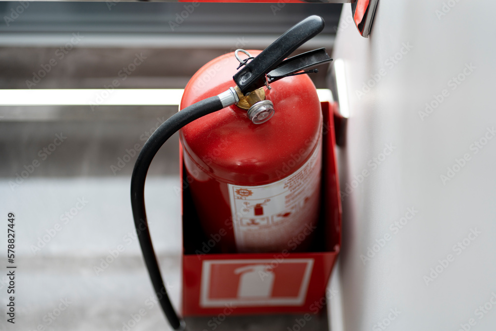 Top view, red fire extinguisher in room, copy space. Life safety ...