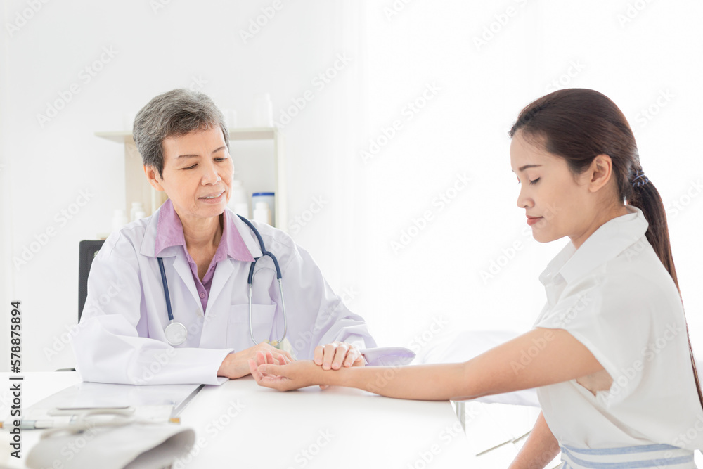 asian doctor use hand screening pulse rate and vital sign of patient ...