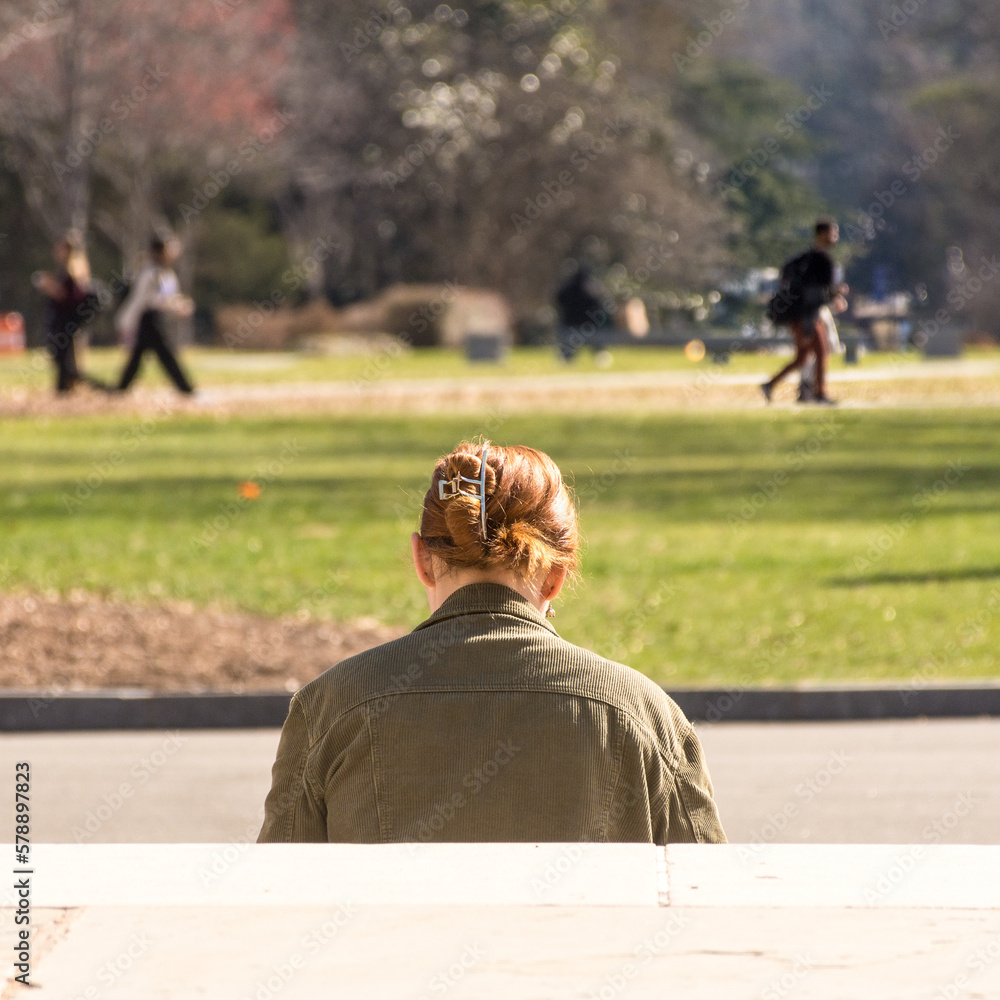 Duke University red haired coed sitting on Chapel Dr. steps, reading ...