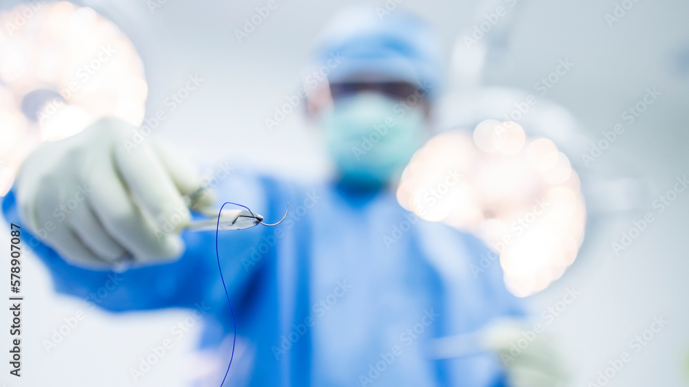 Selective focus on surgical needle holder with blur background.Surgeon ...