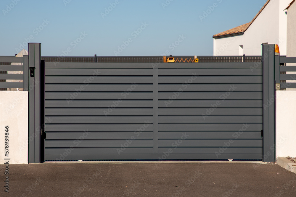 Aluminum portal sliding grey large car gate of modern house in street ...