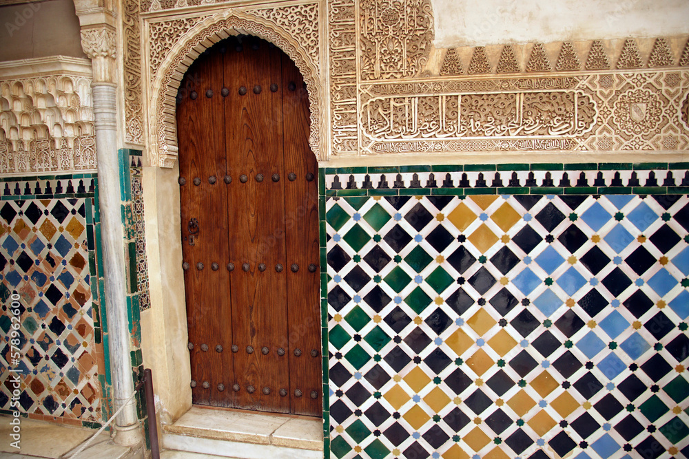 Islamic art tiled wall and door in the Alhambra Palace, Stock Photo ...