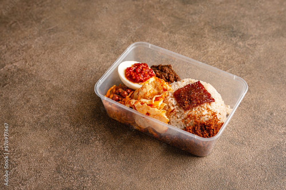 In Indonesian it is called Rice Box or Nasi kotak contains pork rendang ...