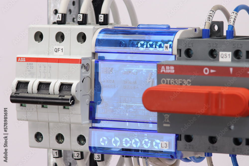 Foto de The ABB reversible switch with a red handle with connected ...