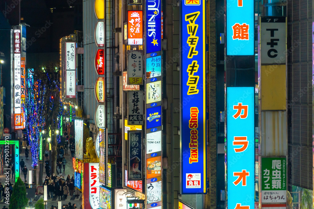 Neon Signs in famous Shinjuku night district at night in Tokyo Japan ...