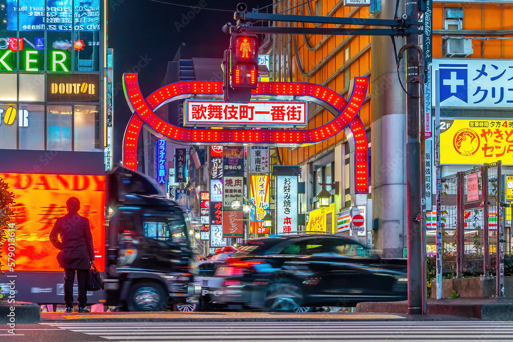 Famous Kabukicho in Shinjuku night district Illuminated by Neon Signs at twilight in Tokyo Japan ...