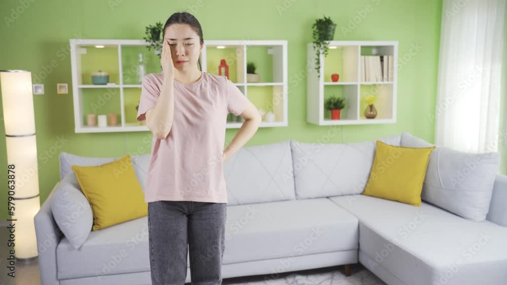 Young asian woman losing her balance and dizzy is fainting. Asian young ...