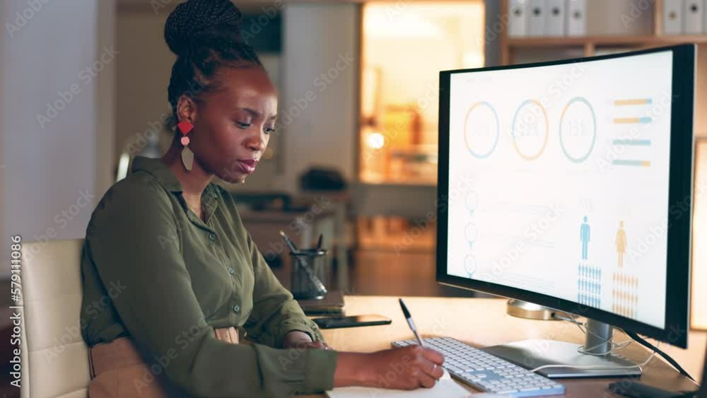 Thinking, computer graphs and black woman writing in office at night ...