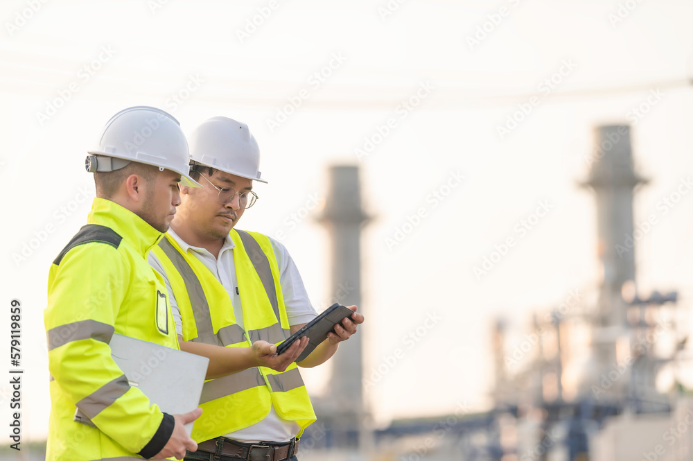 Group Asian man petrochemical engineer working at oil and gas refinery ...
