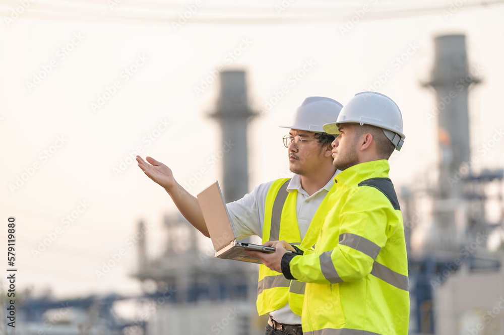 Group Asian man petrochemical engineer working at oil and gas refinery ...