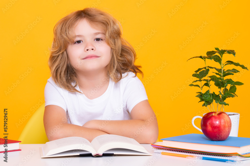School kid reading book. School child student learning in class, study ...