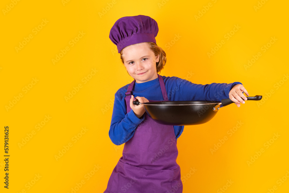 Kid boy chef cook with cooking pan. Chef kid boy making healthy food ...