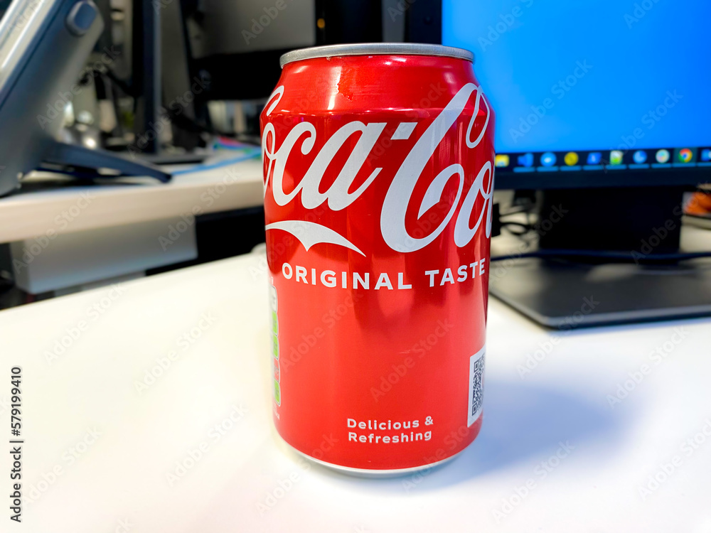 A can of Coca-Cola original on a desk in an office. Stock Photo | Adobe ...