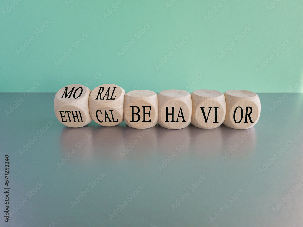 Moral or ethical behavior symbol. Turned cubes, changes words ethical ...