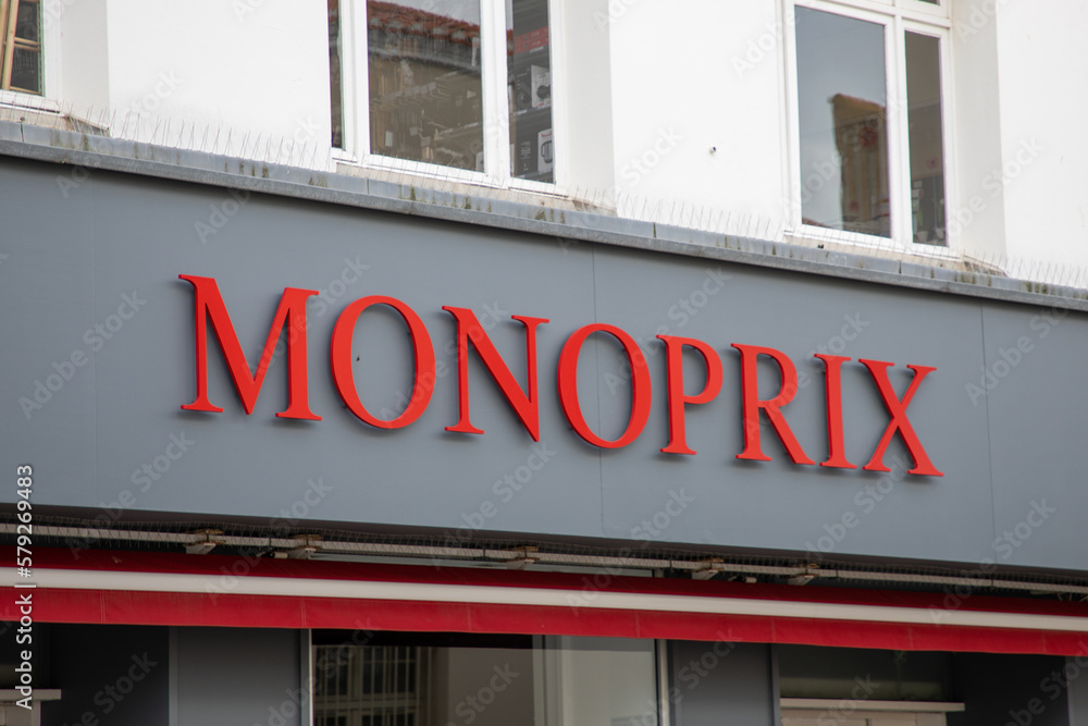 Monoprix logo brand and text sign on store building supermarket facade ...
