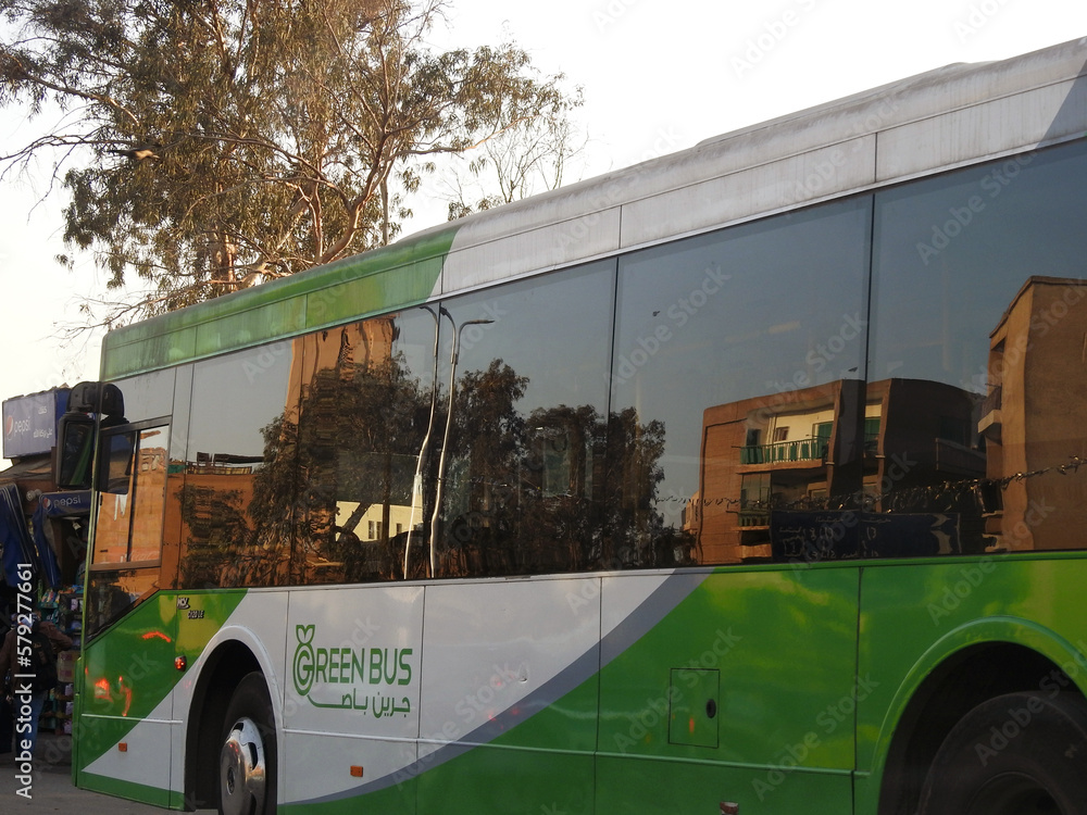 Cairo, Egypt, March 8 2023: The green bus for mass transit transporting ...