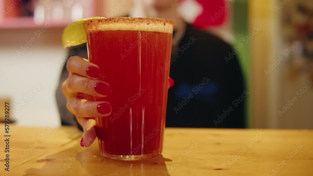 Michelada cooking process, barman making Mexican Bloody Beer with ...