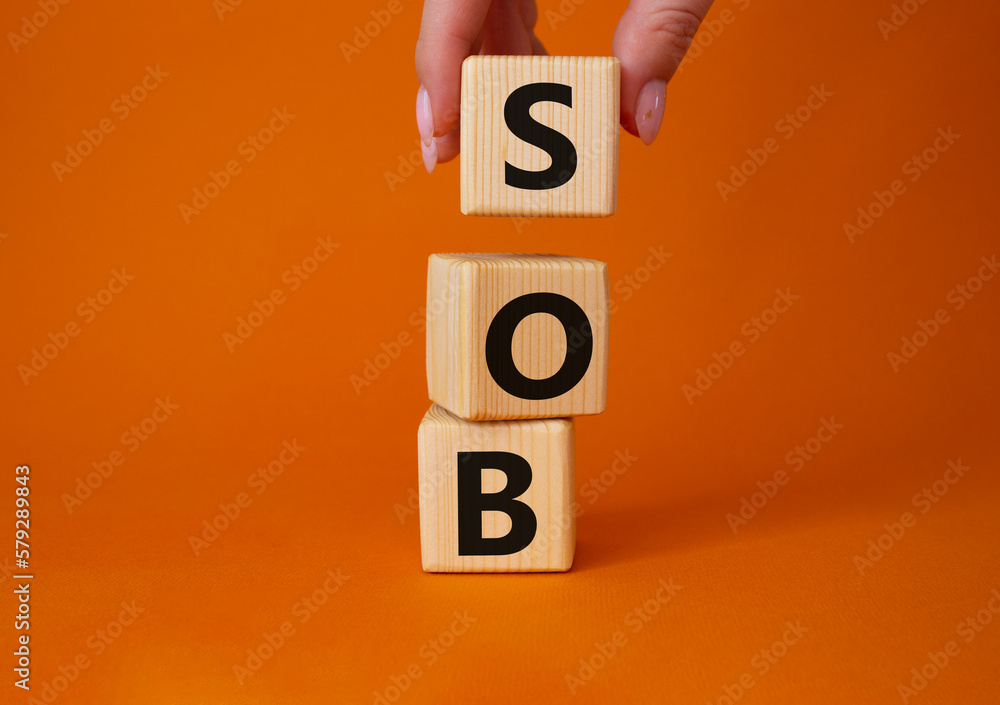 SOB - Shortness of breath symbol. Wooden cubes with words SOB. Doctor ...