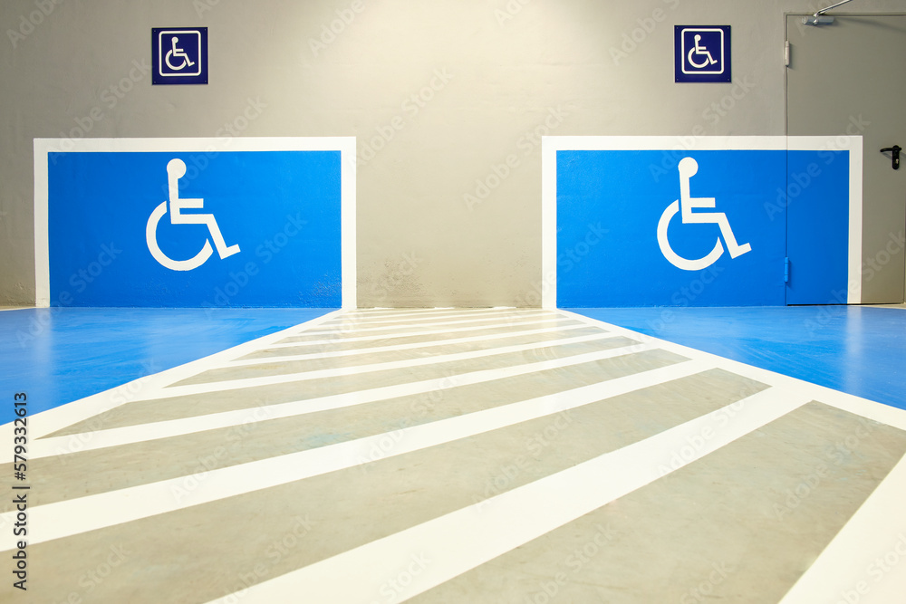 accessible parking spaces for people with a disability and who use a ...