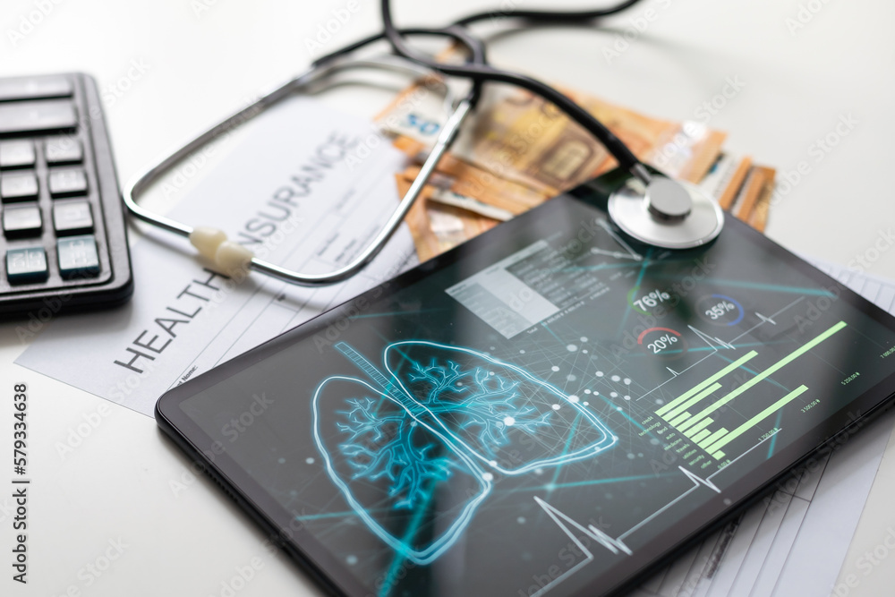 Modern social health insurance program. Tablet computer with healthcare ...