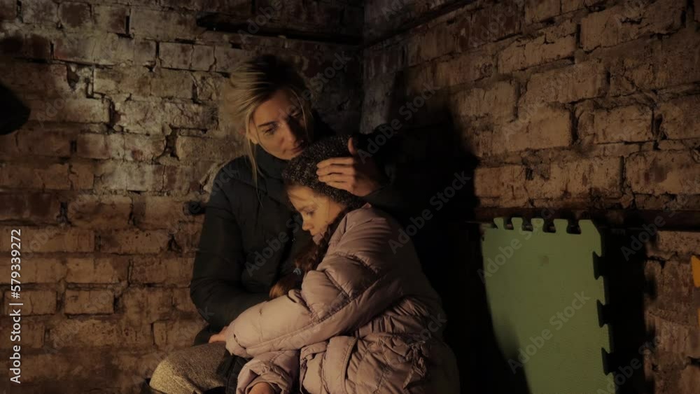 Ukraine war. Shelter. Bunker, Ukrainian mother and child in the ...