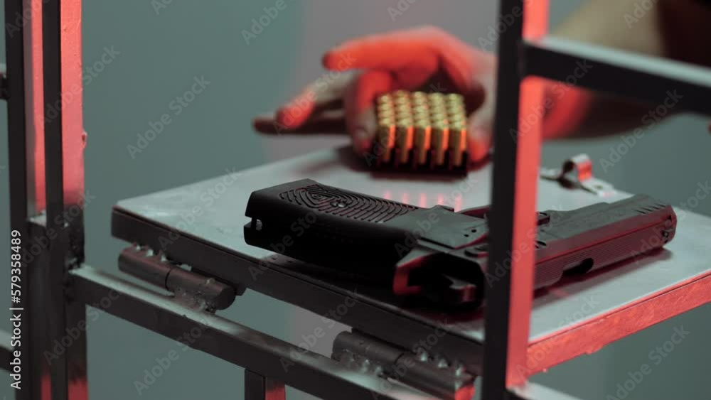 Surrender weapons. Firearm. Gun safe, gun box. Modern black pistol gun ...