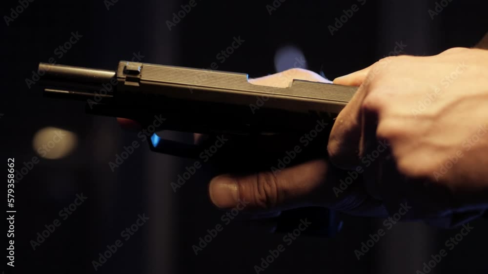 Firearm. Gun safe, gun box. Modern black pistol gun Investigator ...